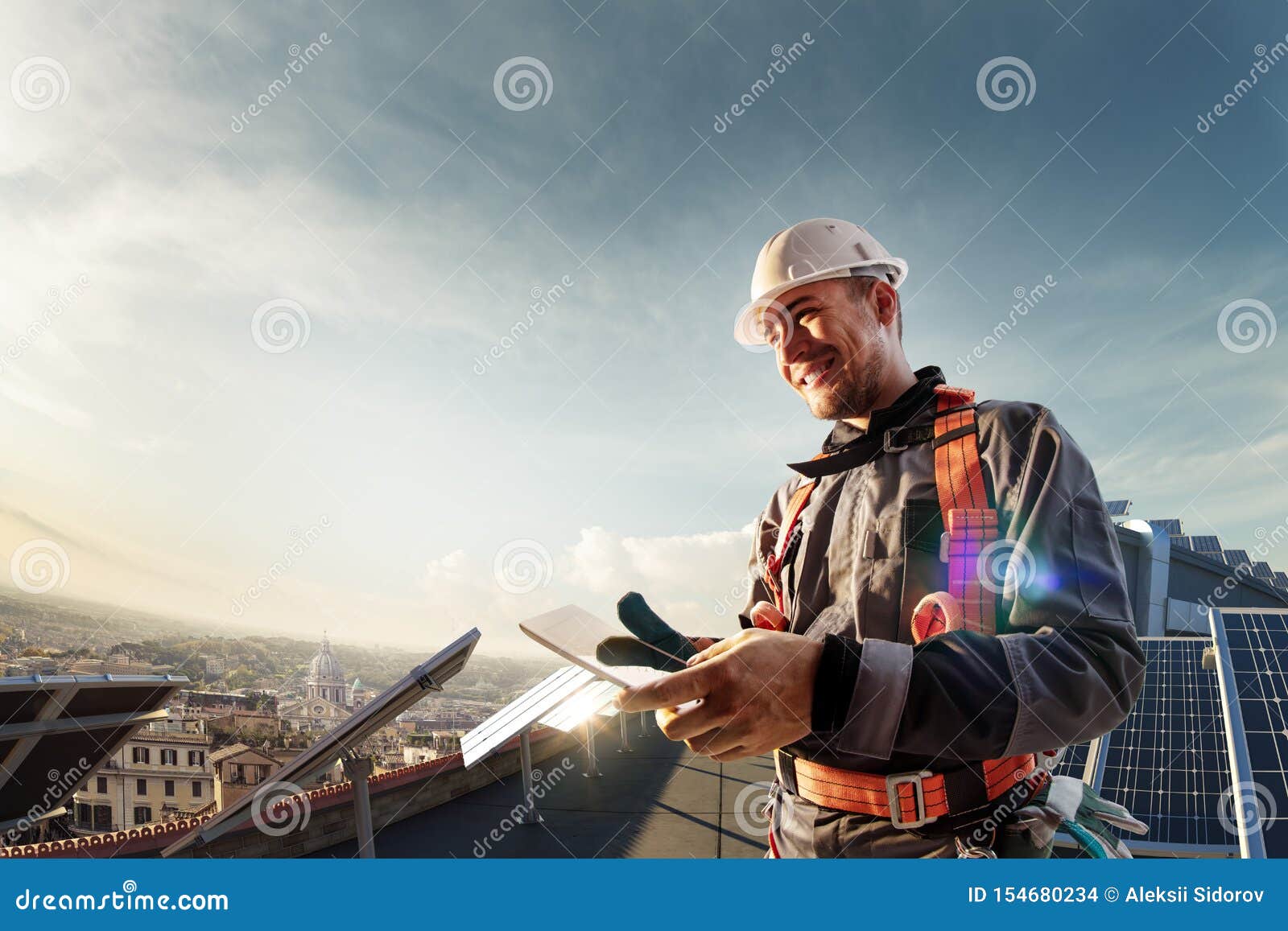 Solar Energy Engineer Using Tablet for Check Power Station Smiling in ...