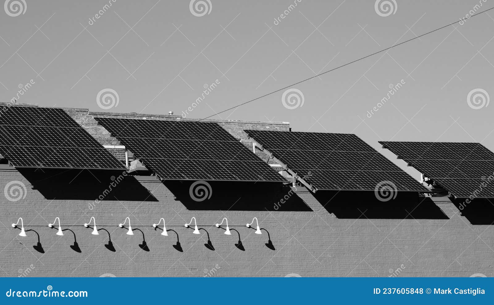 Solar Panels and Light Fixtures on Facade of Building Stock Photo ...