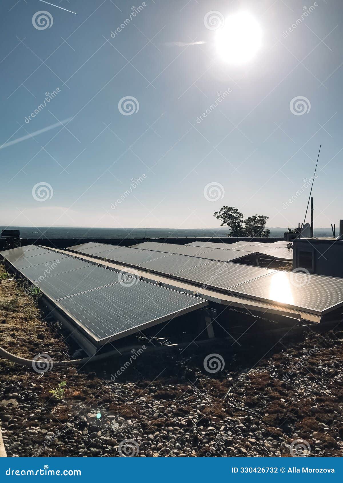 A Solar Panel Array is Installed on a Roof Stock Photo - Image of ...