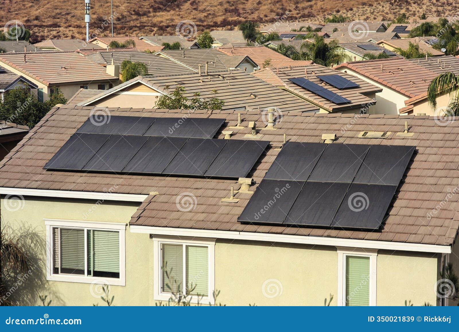 Solar Panel Array Installed on the Roofs of a Number of Residences ...