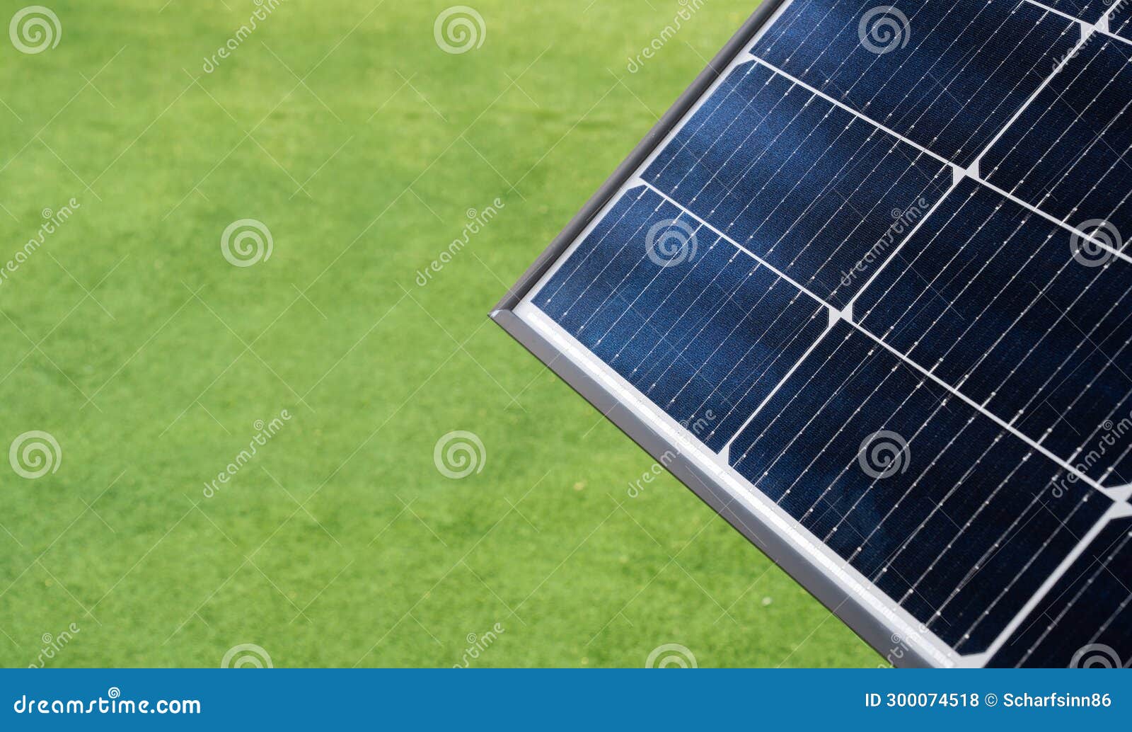 Solar Panel on a Background of Green Grass Stock Photo - Image of blue ...