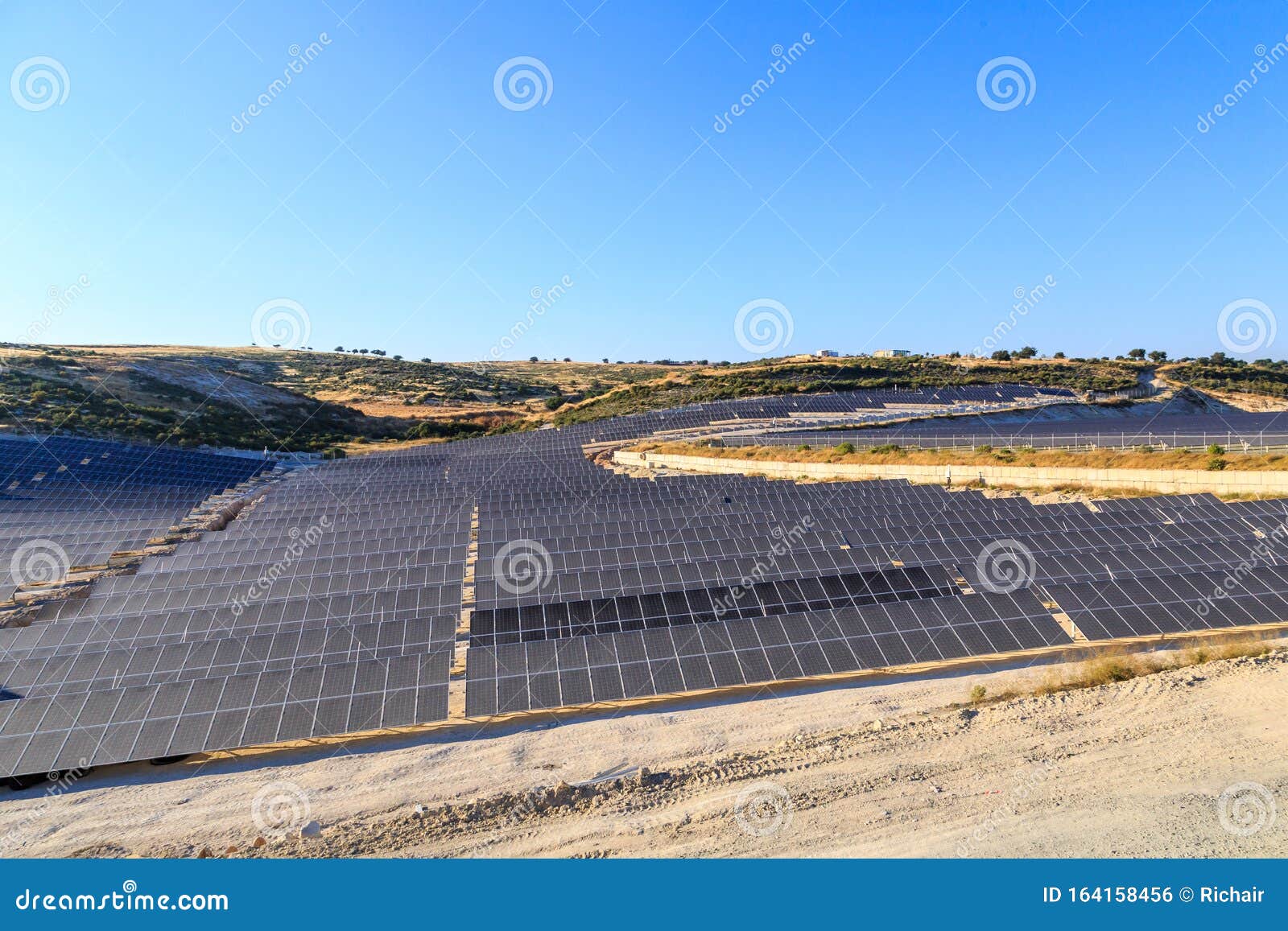 Solar panel farm on Cyprus stock photo. Image of light - 164158456