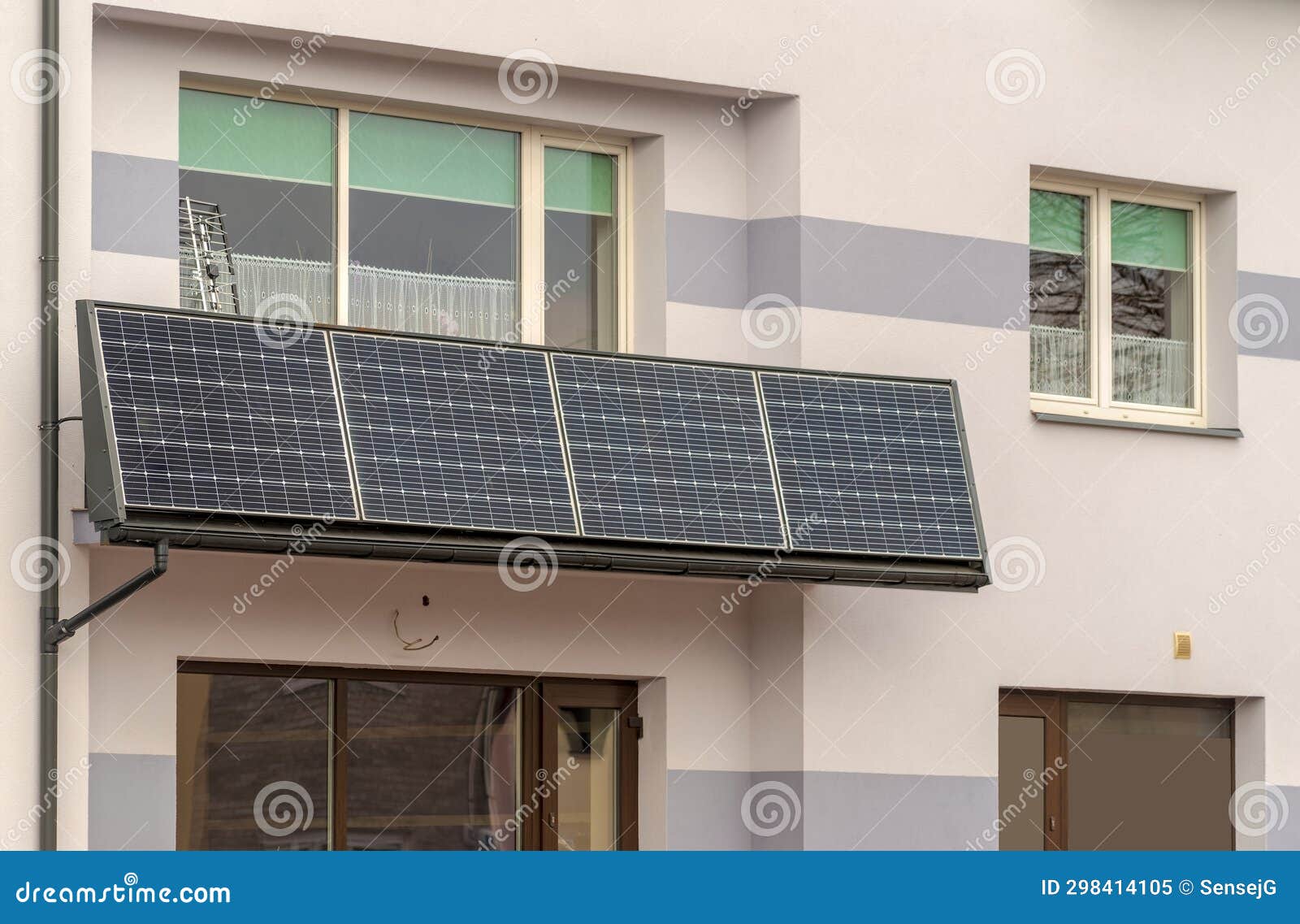 A Solar Panel for Generating Electricity Placed on the Balcony Railing ...