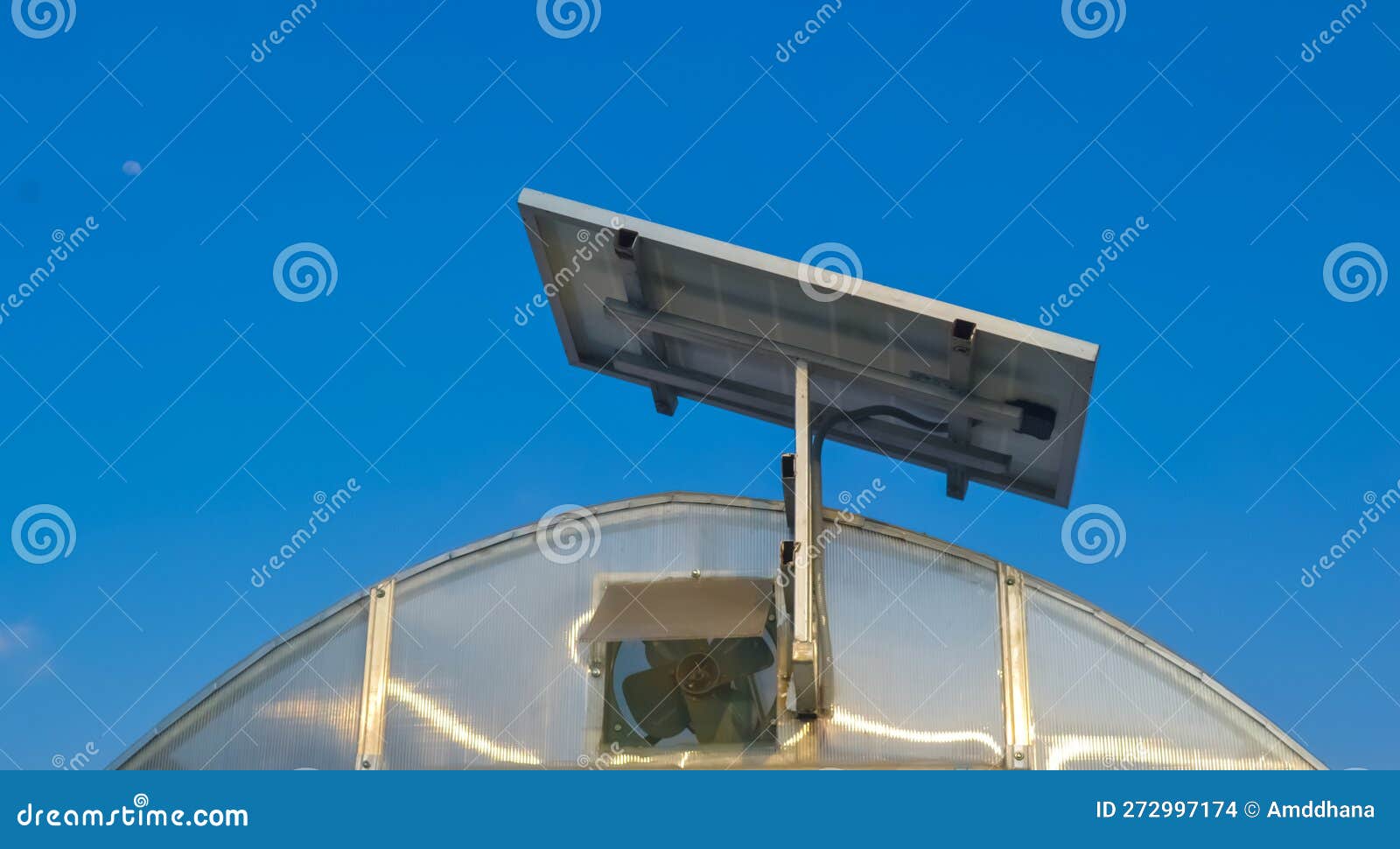 Solar Panel Hut with Blue Sky and Moon in the Background Stock Photo ...