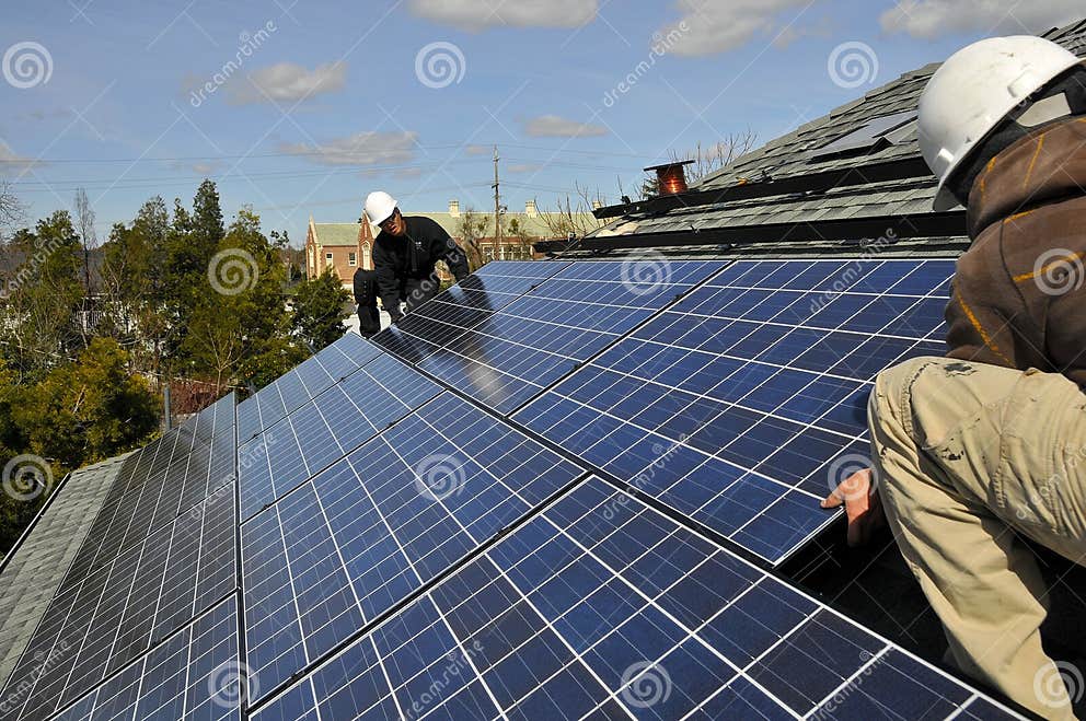 Solar Panel Installers stock image. Image of efficient - 18729765