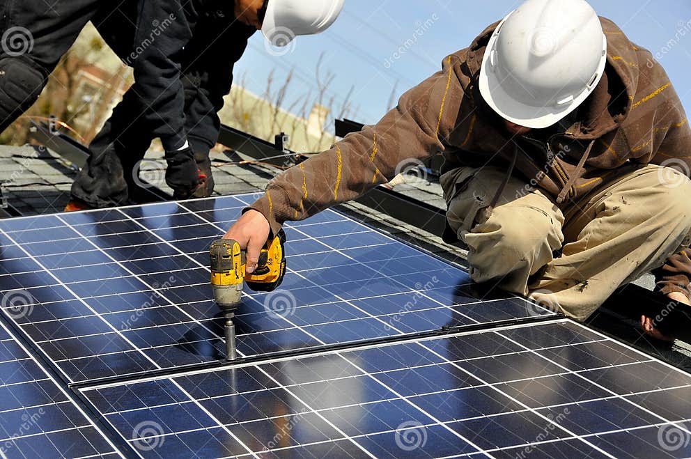 Solar Panel Installers 2 stock image. Image of energy - 18730995