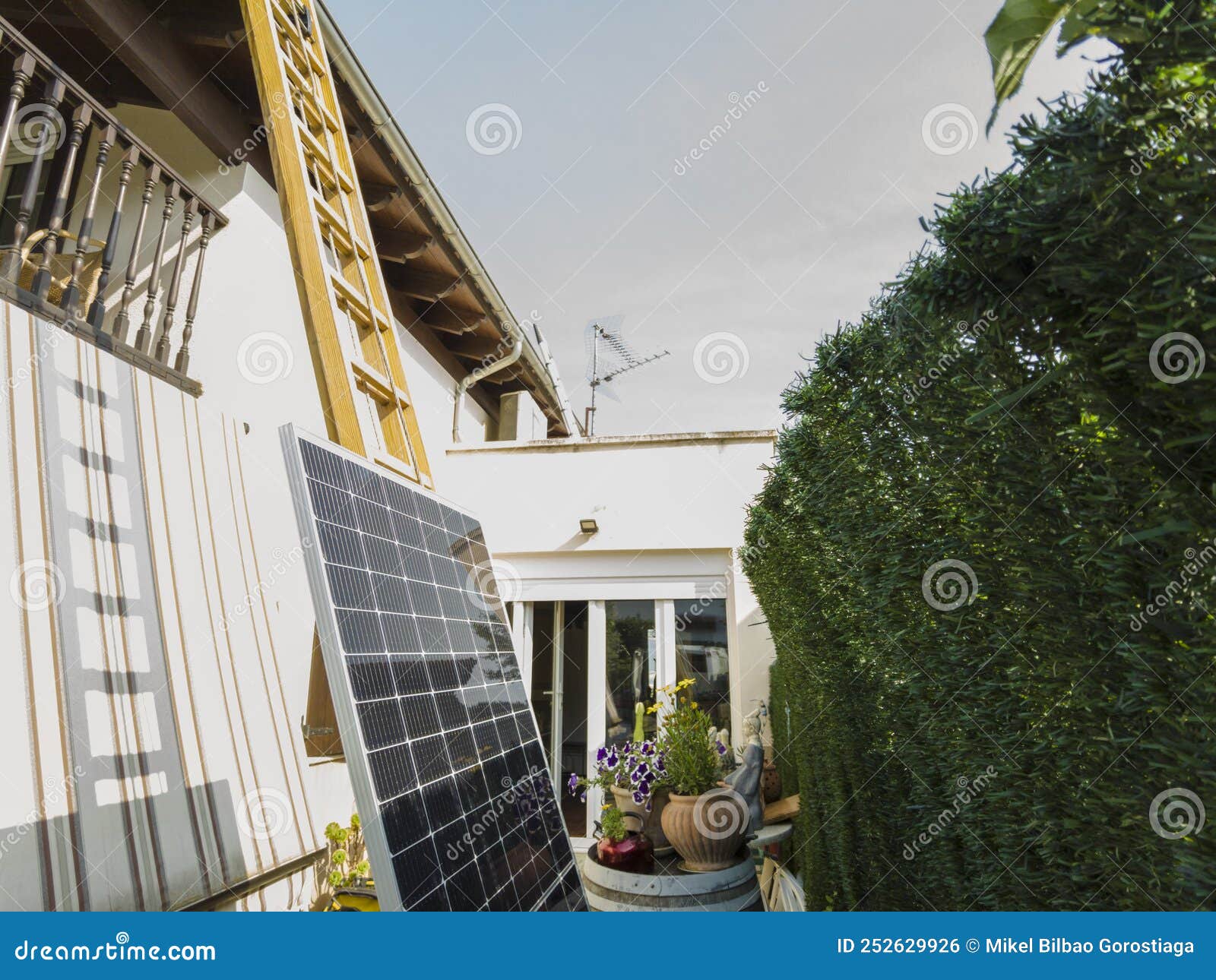 Solar panel in a ladder. stock photo. Image of generation - 252629926