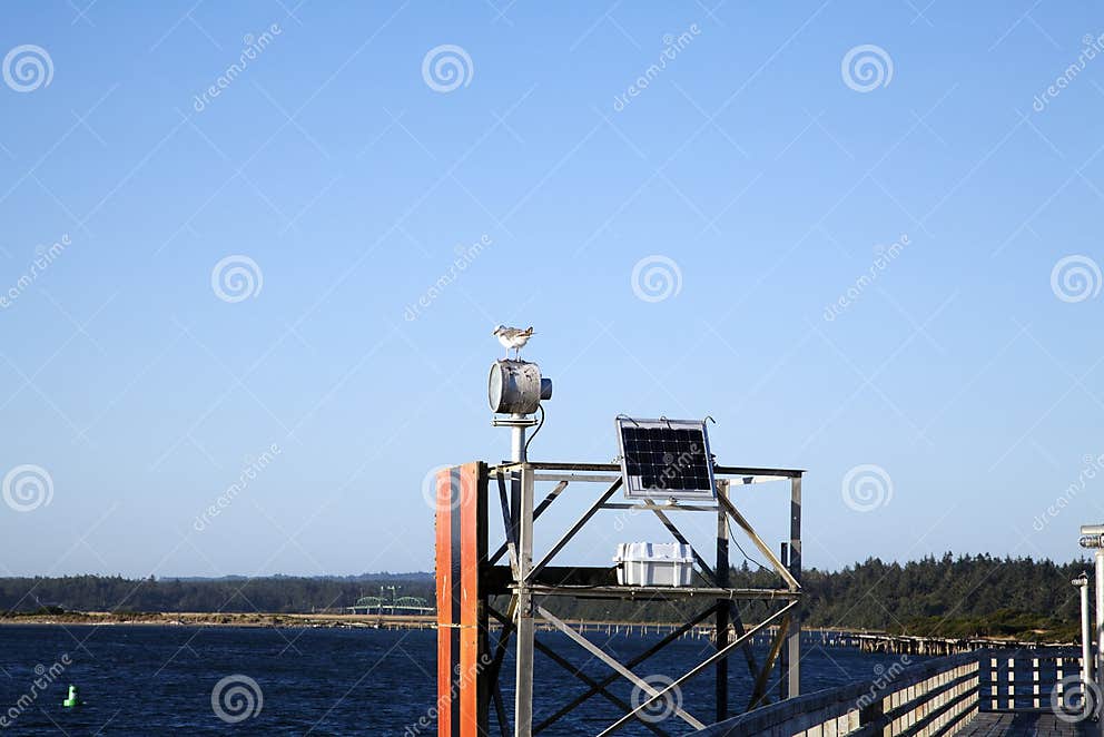 Solar Panel Navigational Aid Dock Seagull Blue Sky Stock Image - Image ...