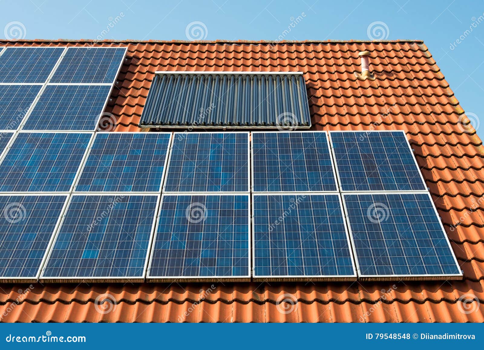 Solar panel on a red roof stock photo. Image of light - 79548548