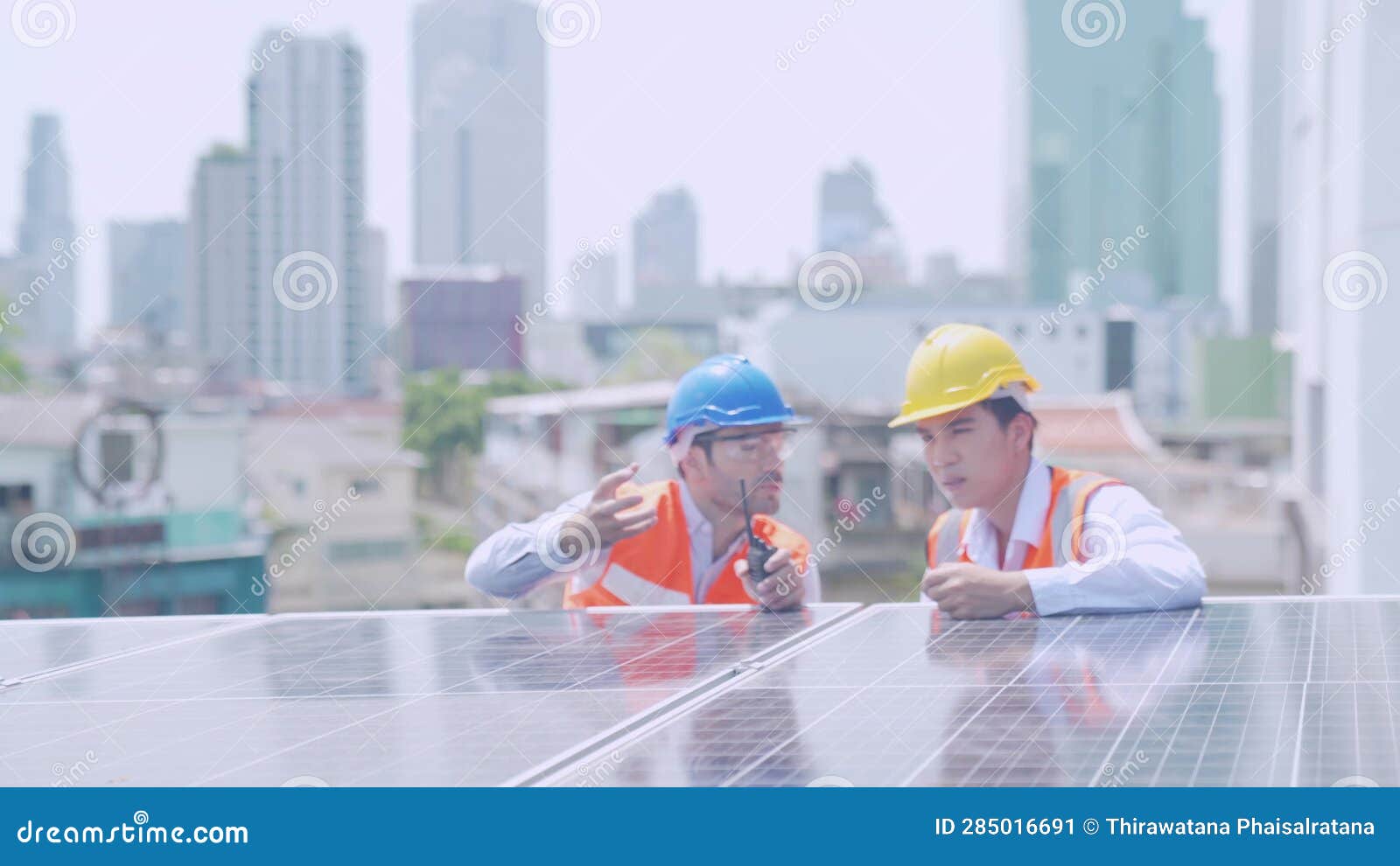 Solar Panel Technician on Roof. Engineer and Young Technician ...