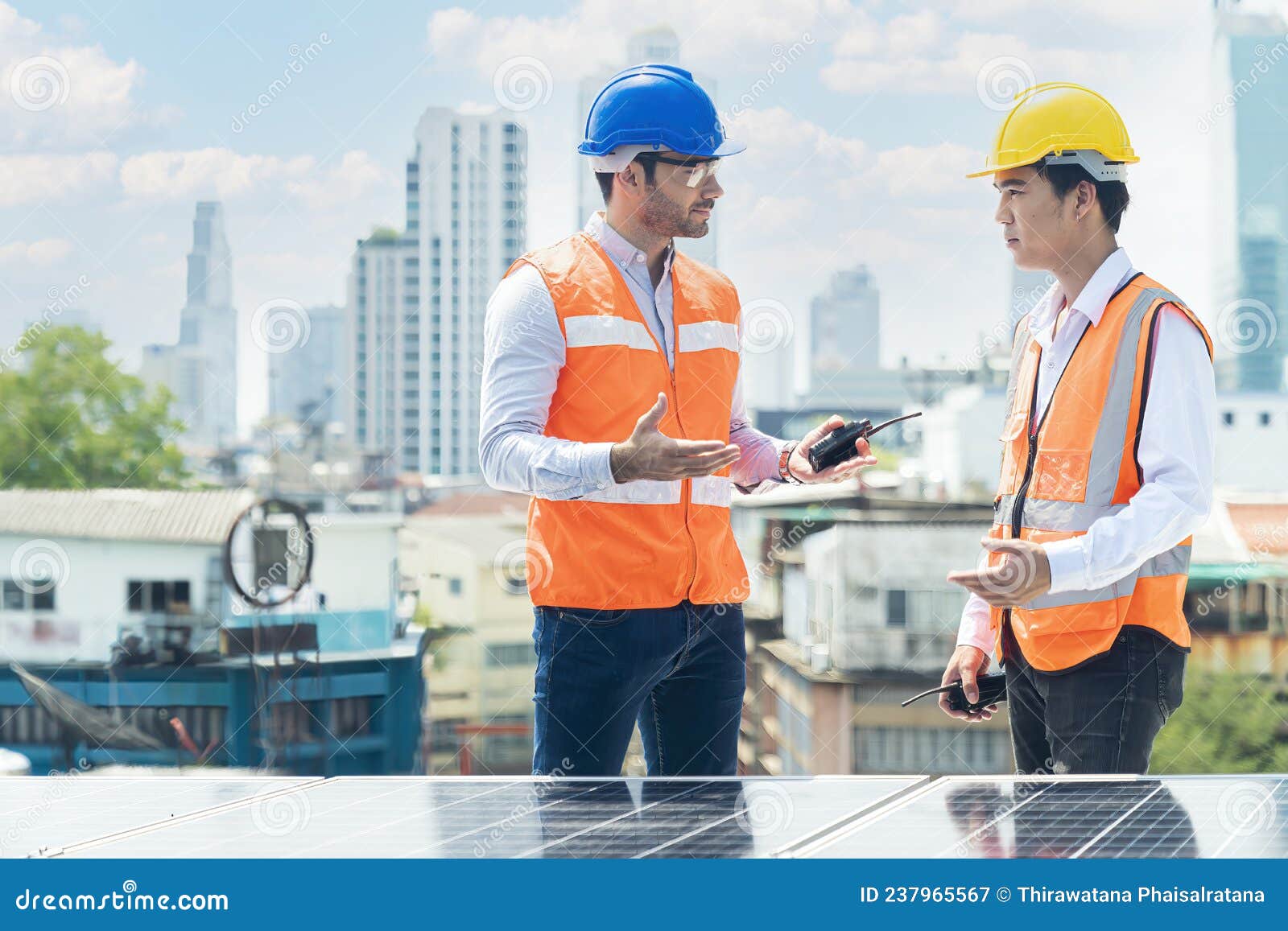 Solar Panel Technician on Roof. Engineer and Young Technician ...