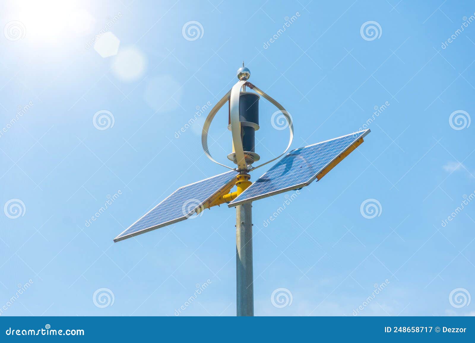 Solar Panel and Wind Propeller Mounted on a Pole in the City for Local ...