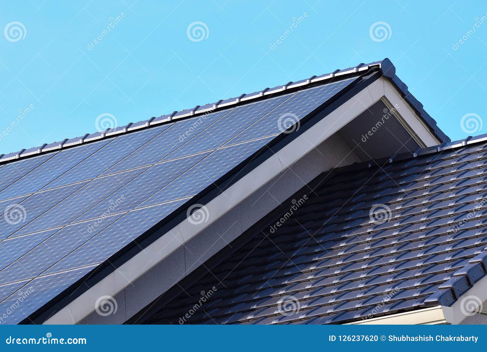 Solar Panels Fitted on Modern House Roof Stock Photo - Image of blue ...