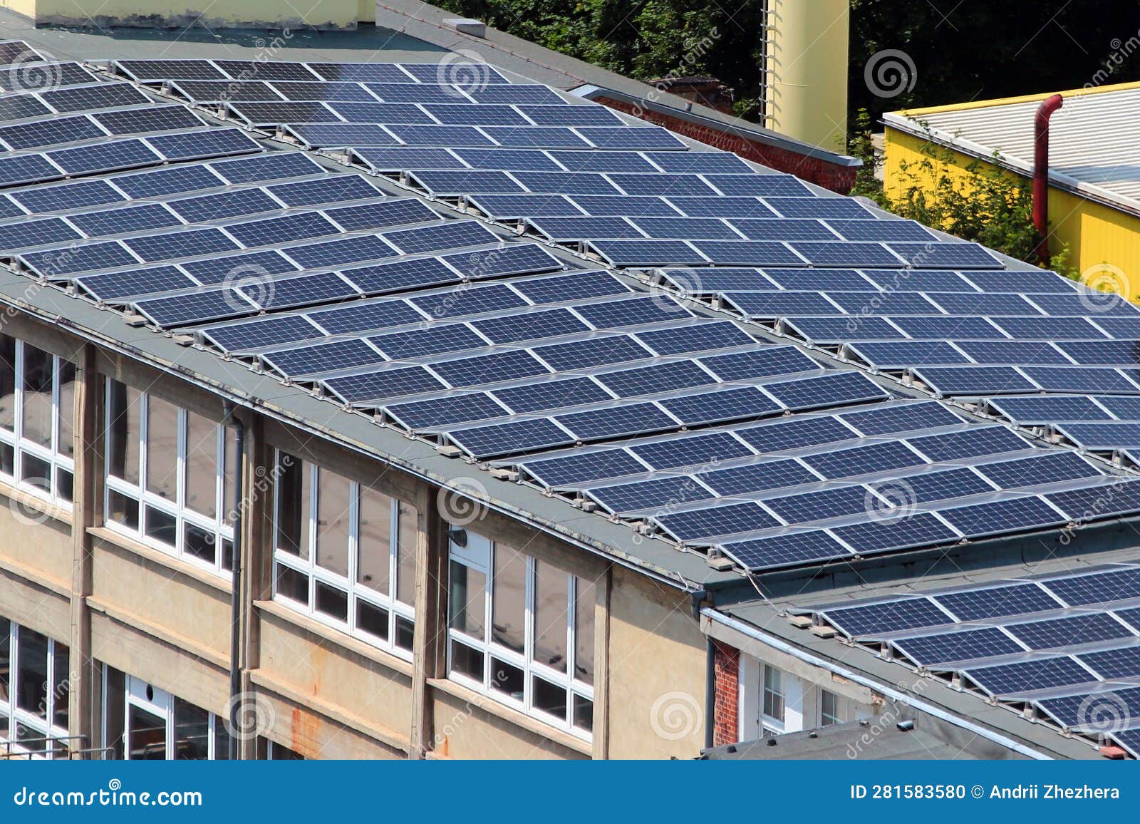 Solar Panels on a Flat Roof of a Building Stock Photo - Image of ...
