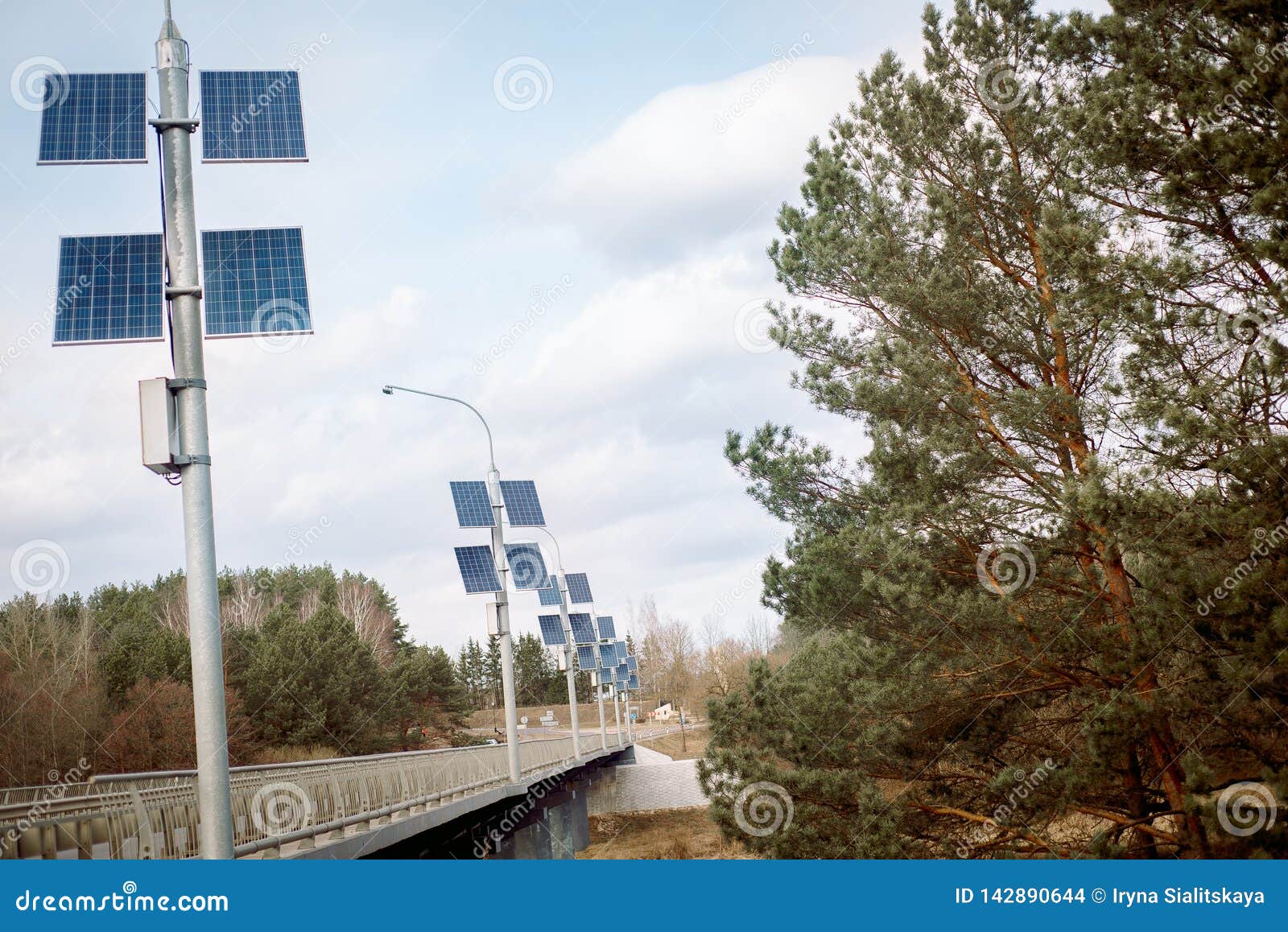 Solar Panels in the Forest. Bridge and River in Spring Stock Photo ...