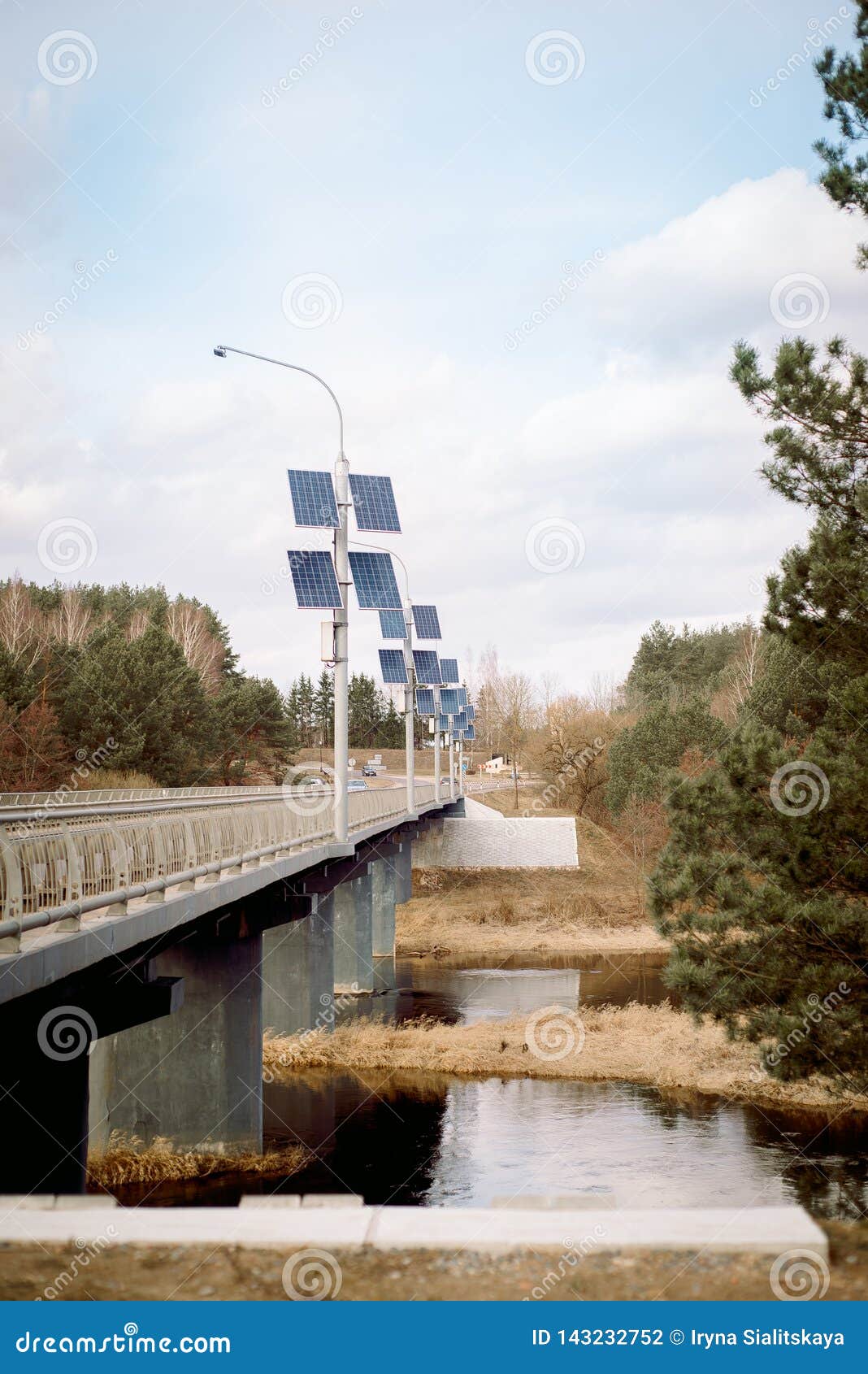 Solar Panels in the Forest. Bridge and River in Spring Stock Photo ...