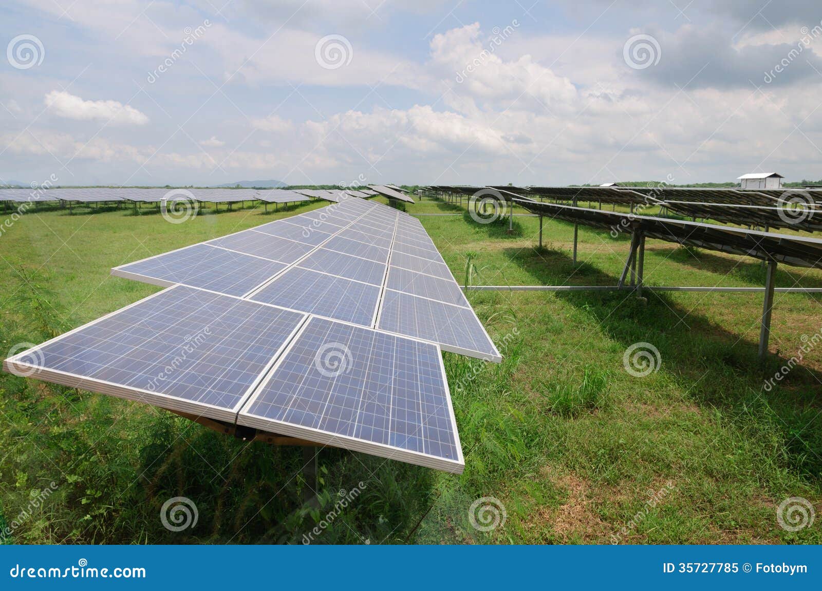 Solar Panels in the Green Field Stock Image - Image of sunlight ...
