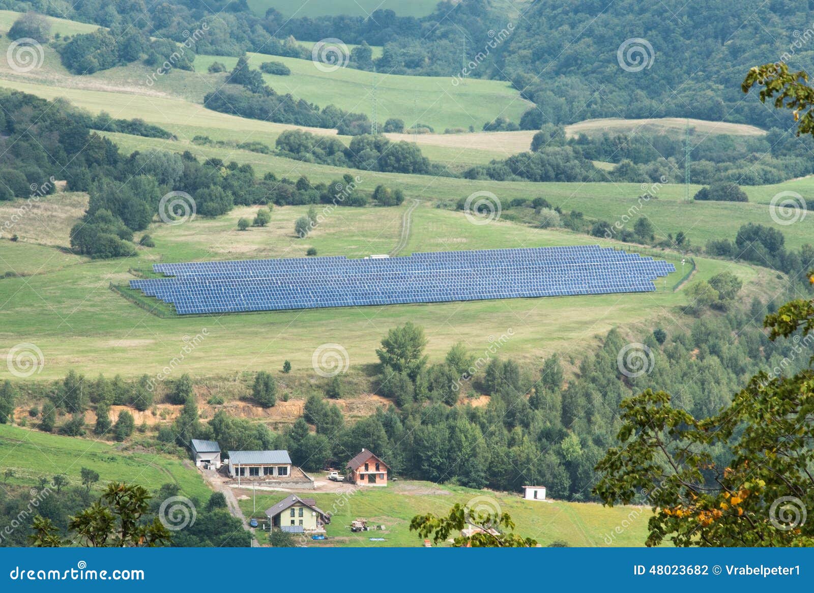 Solar panels in a meadow stock photo. Image of land, global - 48023682
