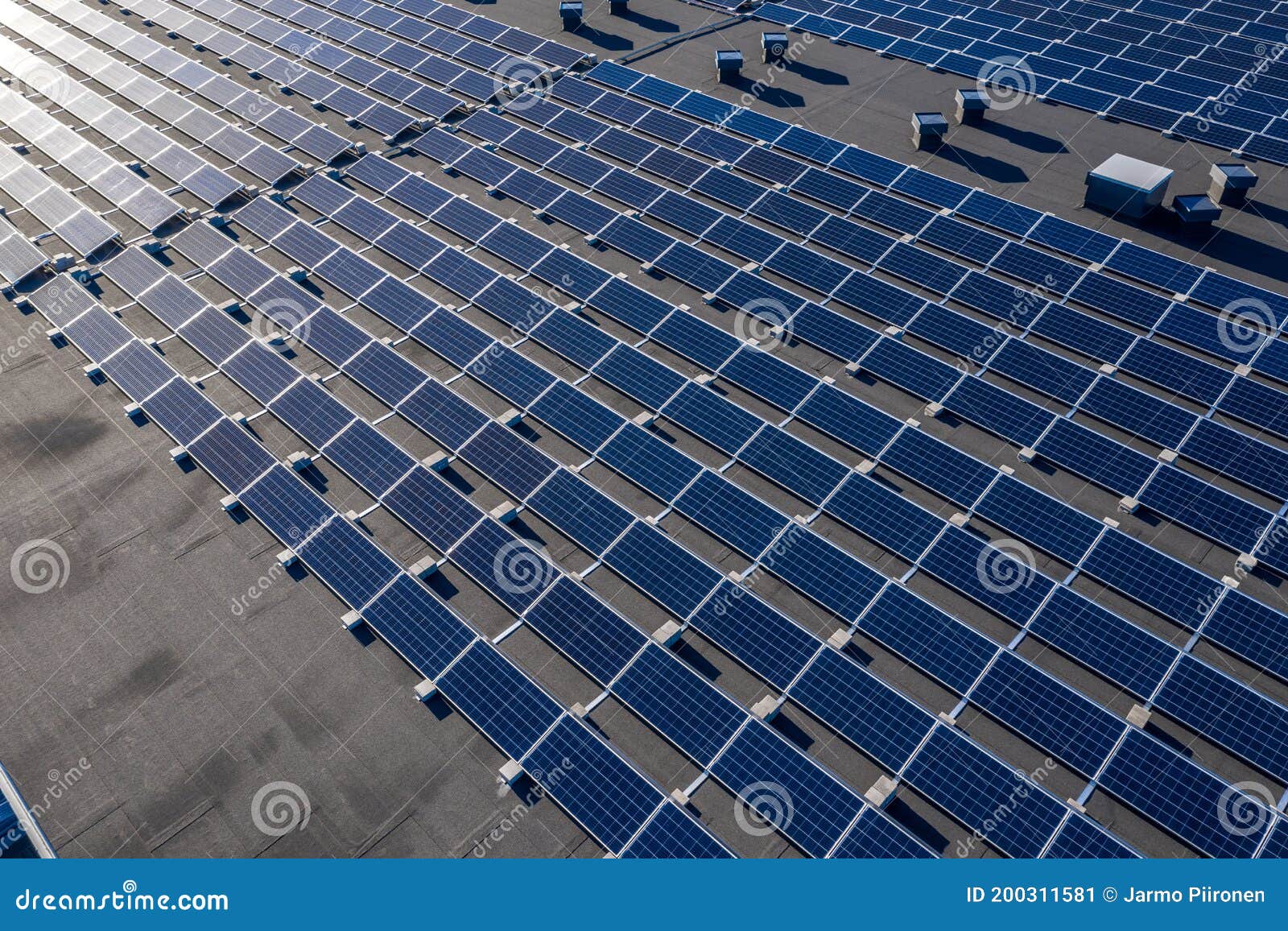 Solar panels on sunny roof stock image. Image of sunlight - 200311581