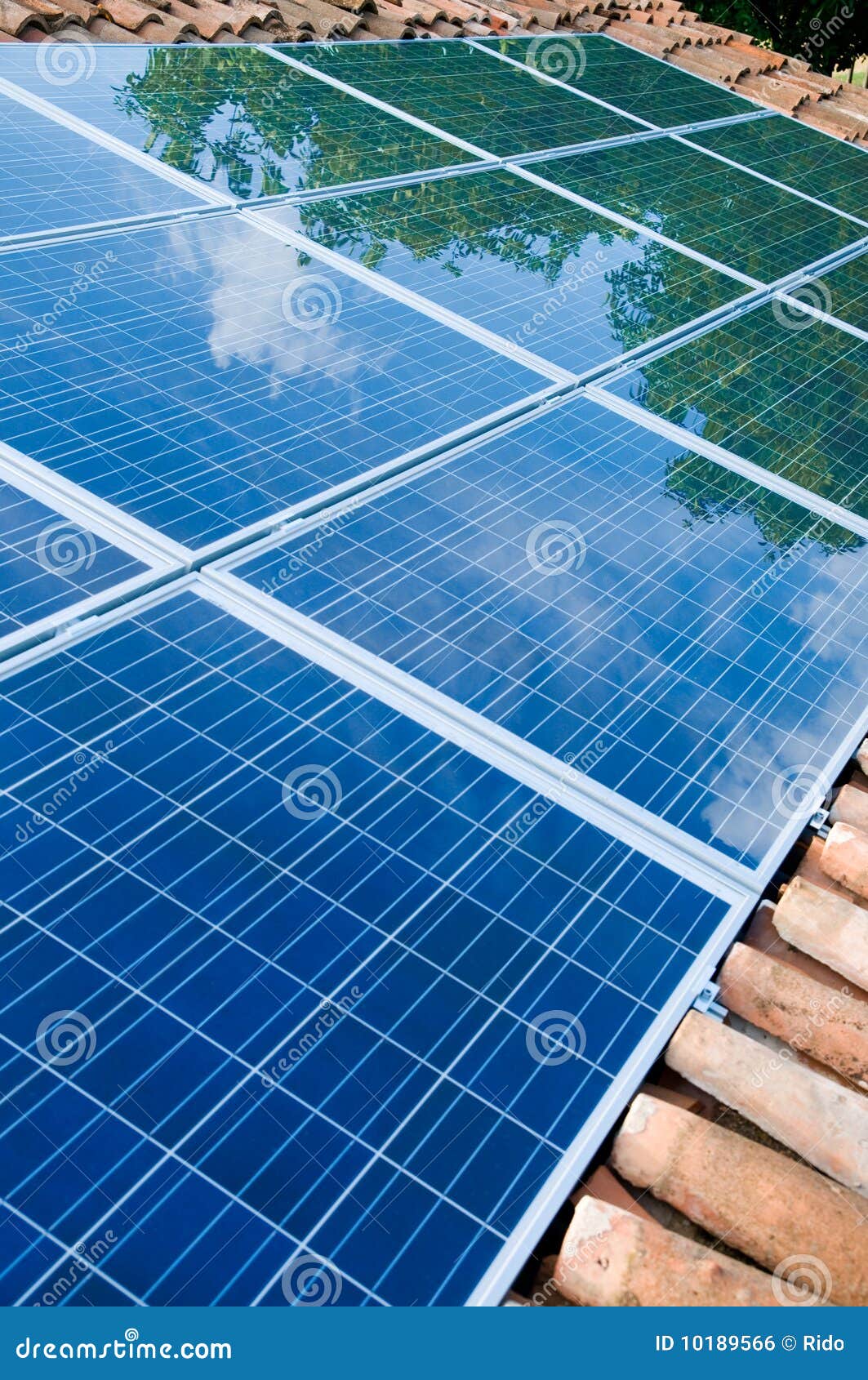 Solar Panels on Roof with Green Reflection Stock Photo - Image of ...