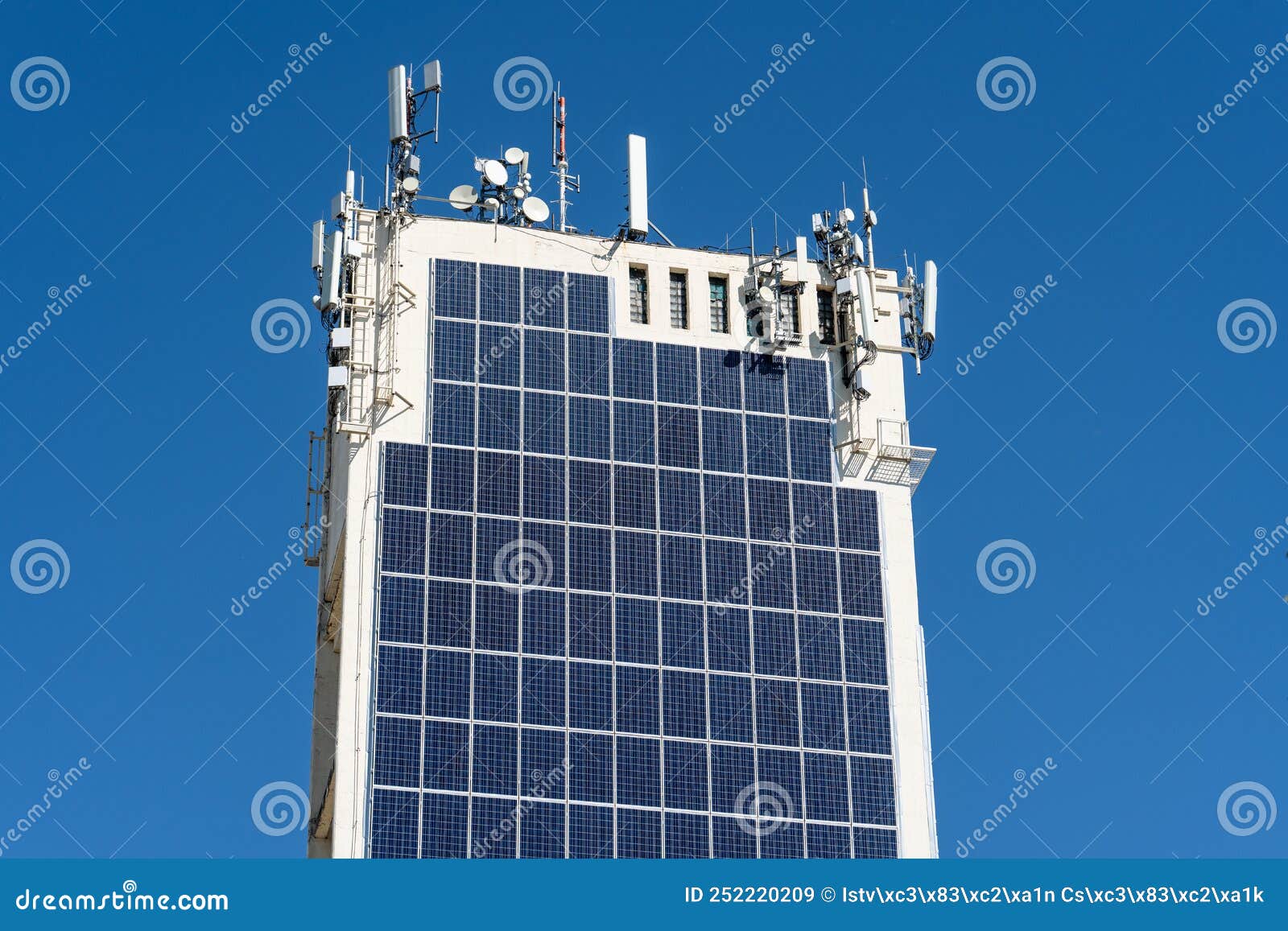 Solar panels on a tower stock image. Image of landscape - 252220209