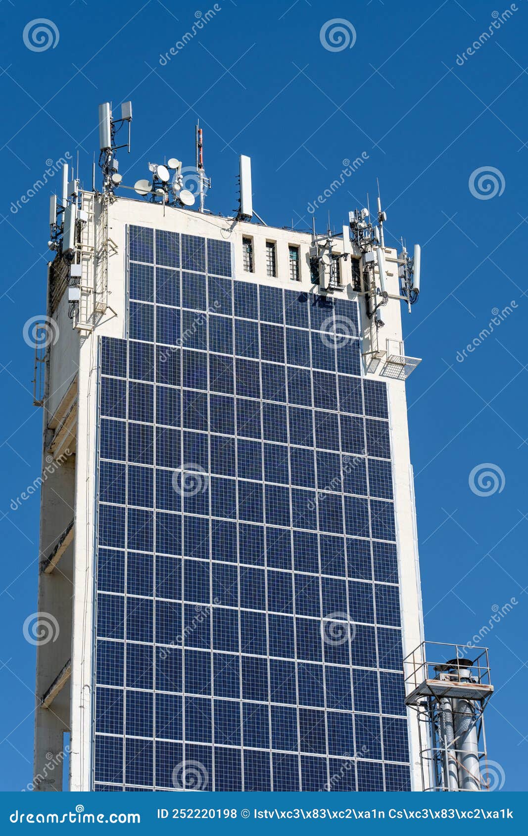 Solar panels on a tower stock photo. Image of climate - 252220198