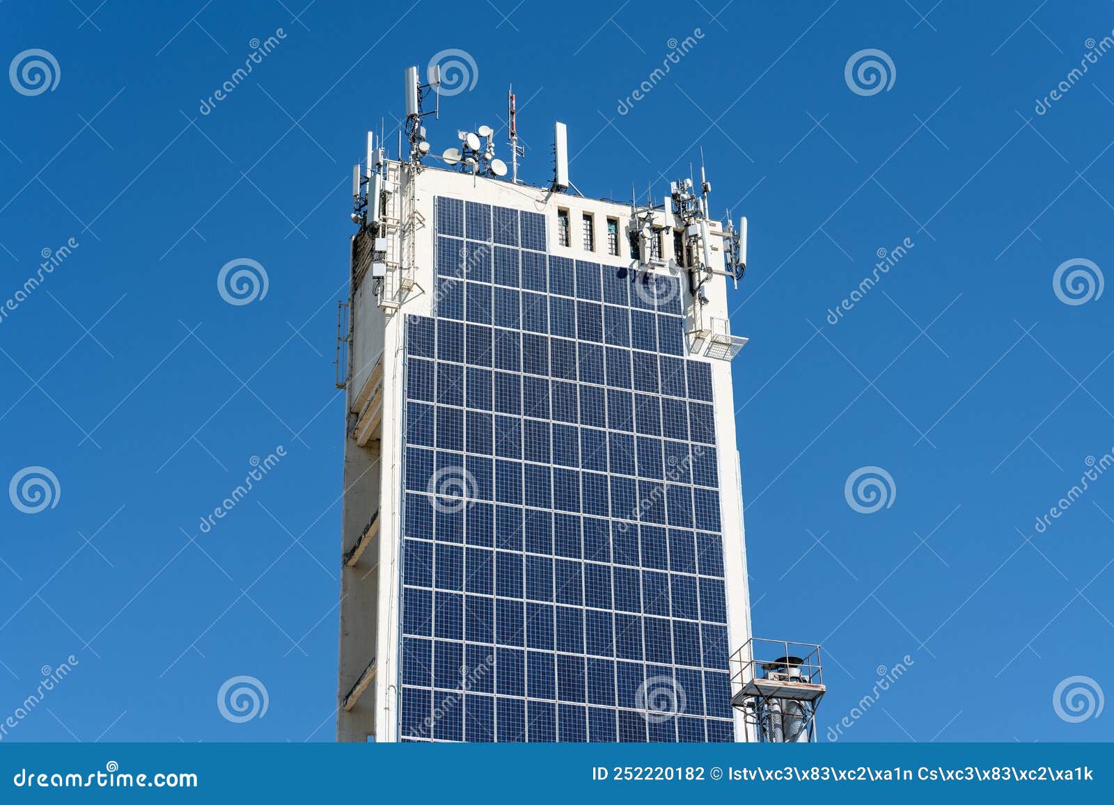 Solar panels on a tower stock photo. Image of electrical - 252220182