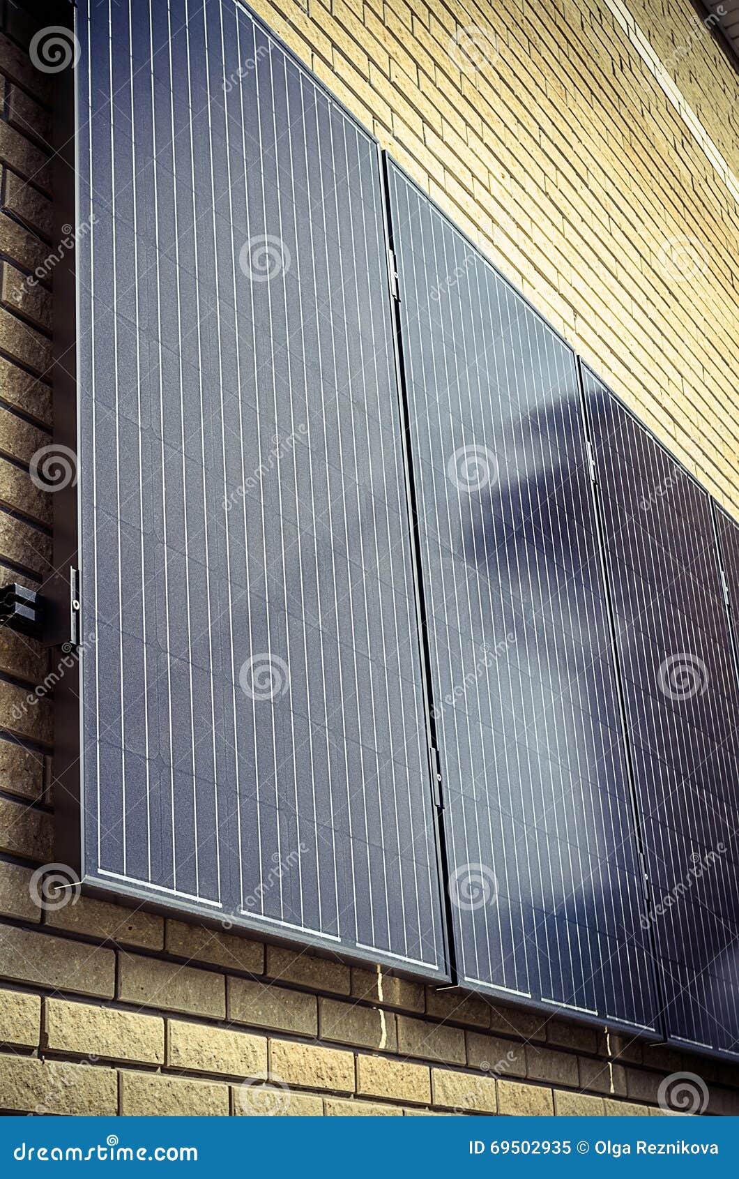 Solar panels on the wall stock image. Image of ecological - 69502935