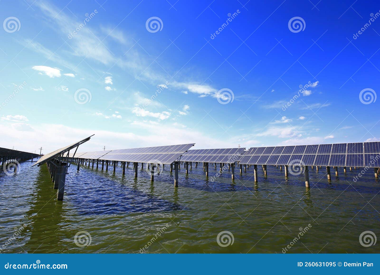 Solar panels on the water stock image. Image of windfarm - 260631095