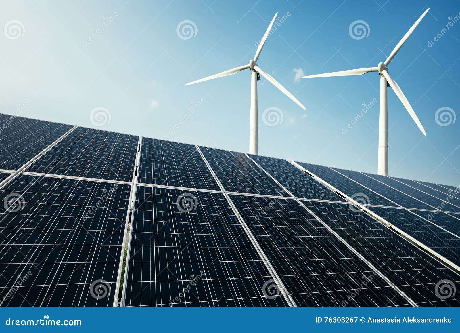 Solar Panels and a Windmill Generate Electricity from the Sun Stock ...