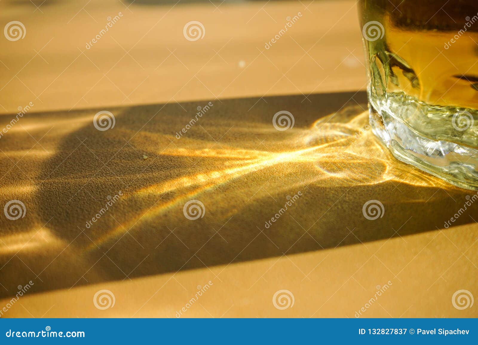 Solar Patterns through a Glass of Water Stock Image - Image of water ...