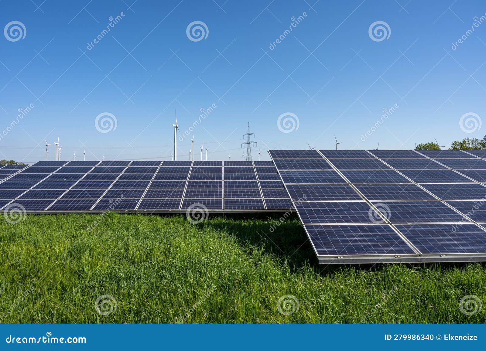 Solar Plant with Power Lines and Wind Turbines Stock Photo - Image of ...