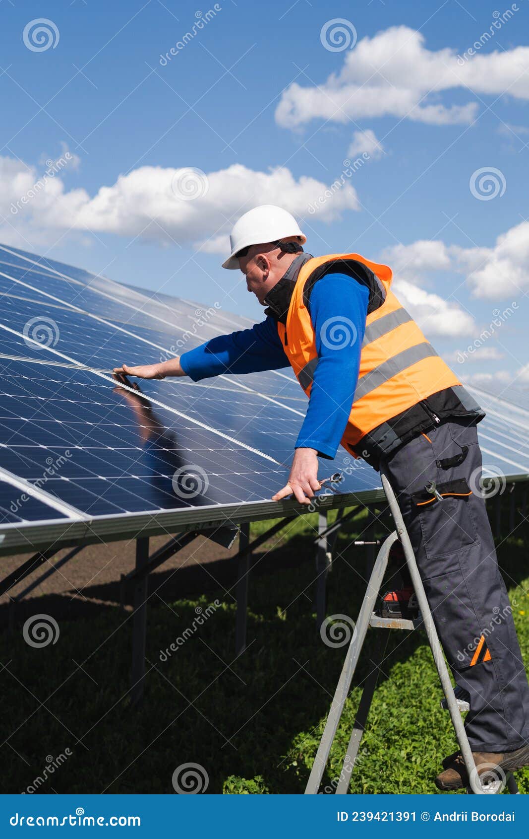 Solar Power Plant Worker on Stepladder Makes a Visual Inspection of ...
