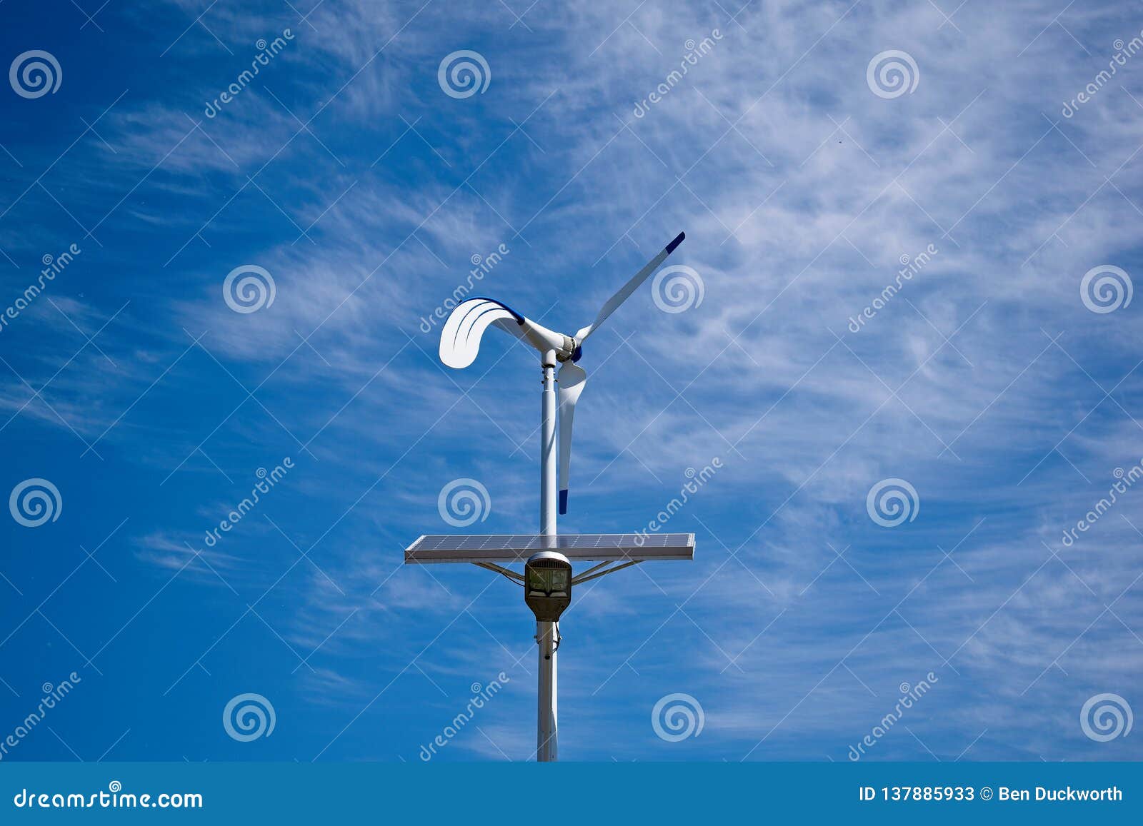A Solar Wind Generator on a Light Pole Stock Image - Image of wind ...