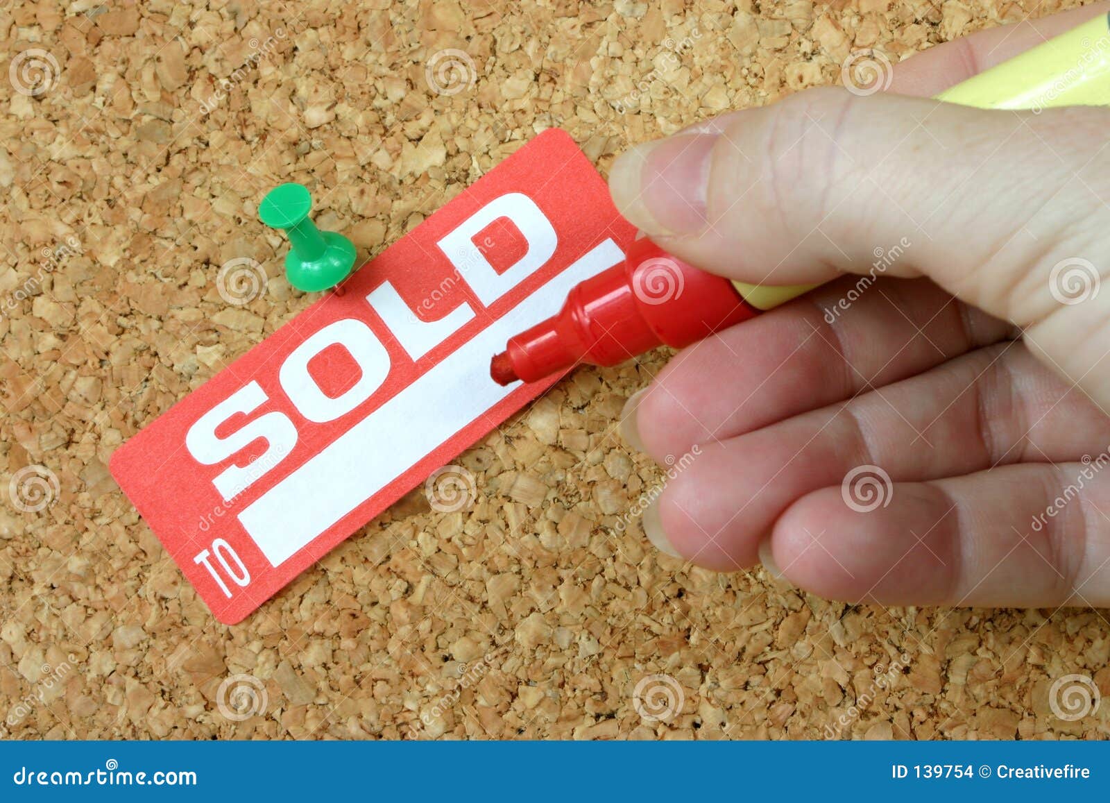 Sold To stock photo. Image of cork, board, hand, sale, write - 139754