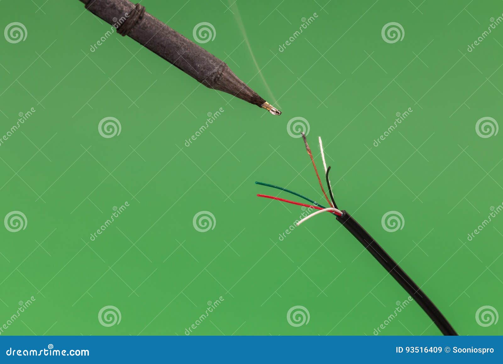 Soldering a Copper Wire on Green Background Stock Image - Image of ...