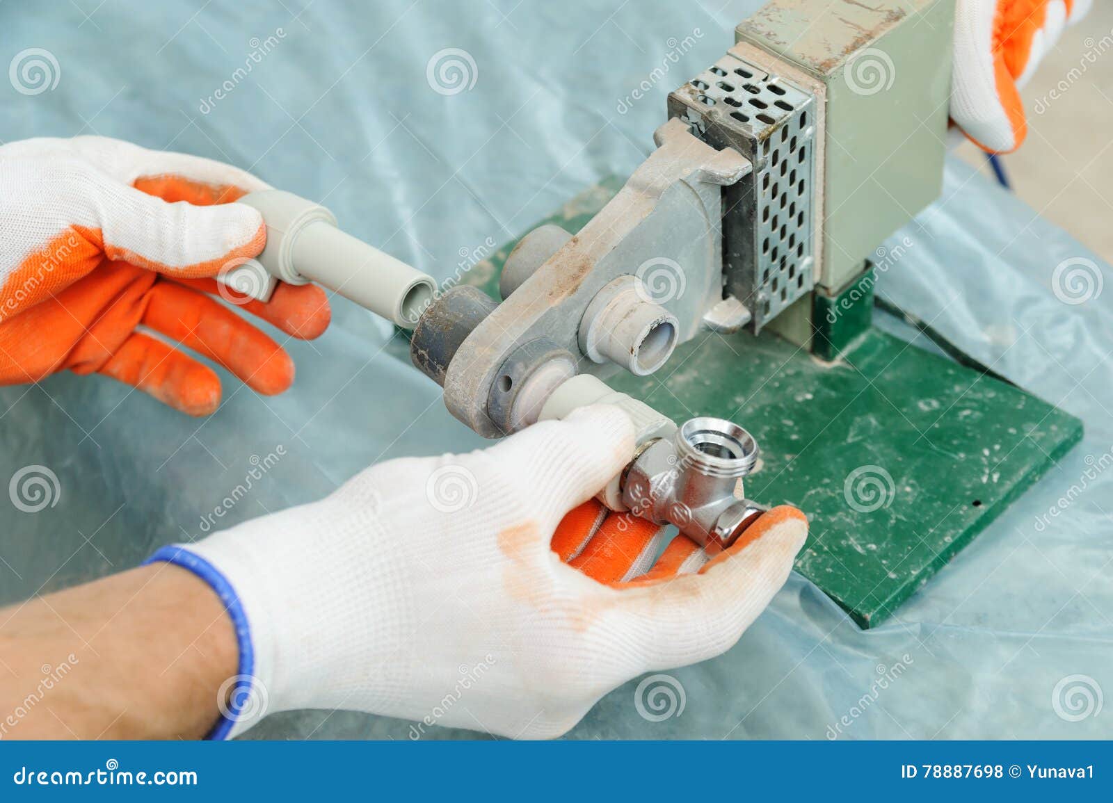 Soldering plastic pipe. stock photo. Image of repair - 78887698