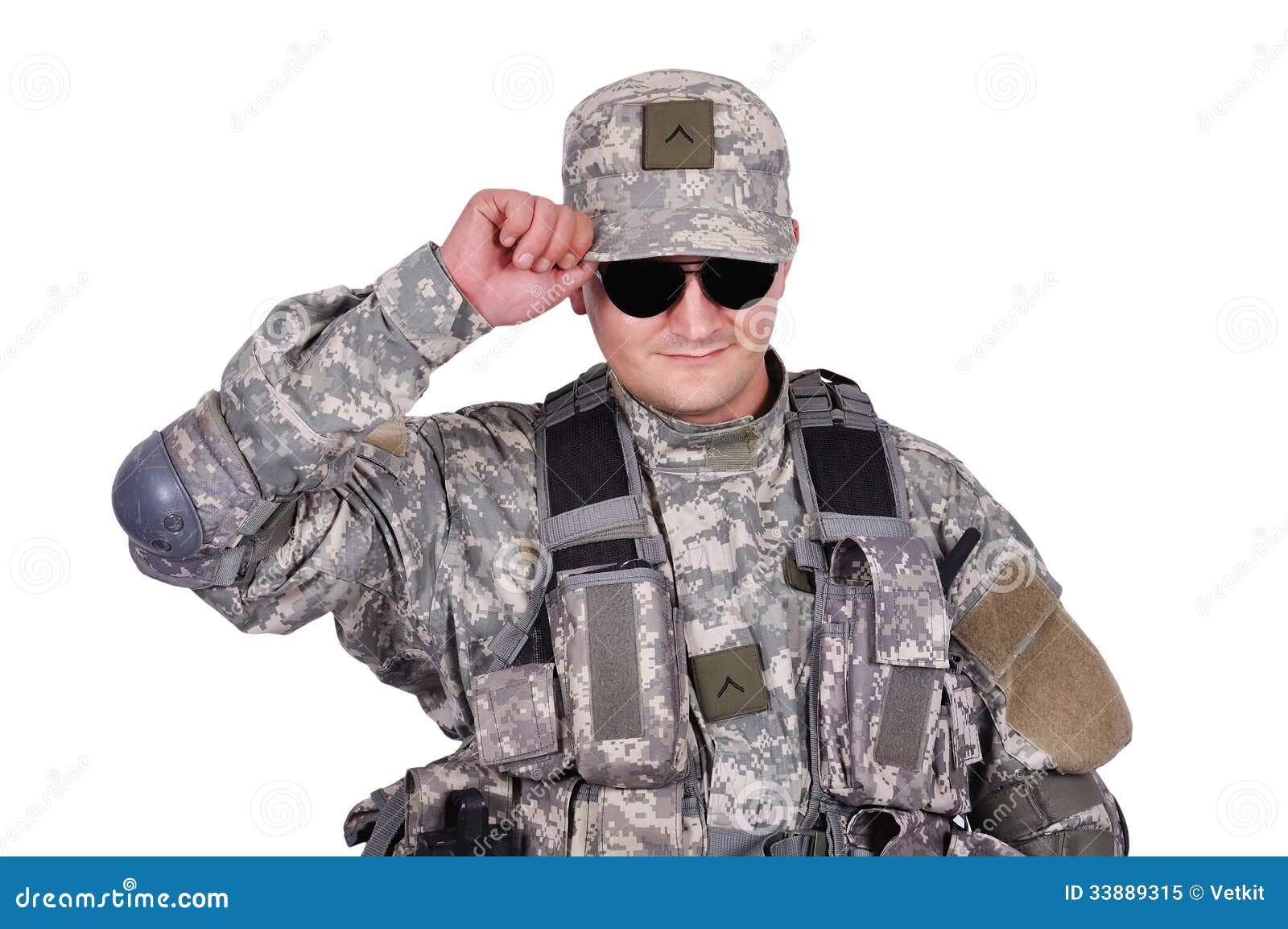 Soldier adjusts his cap stock image. Image of commando - 33889315