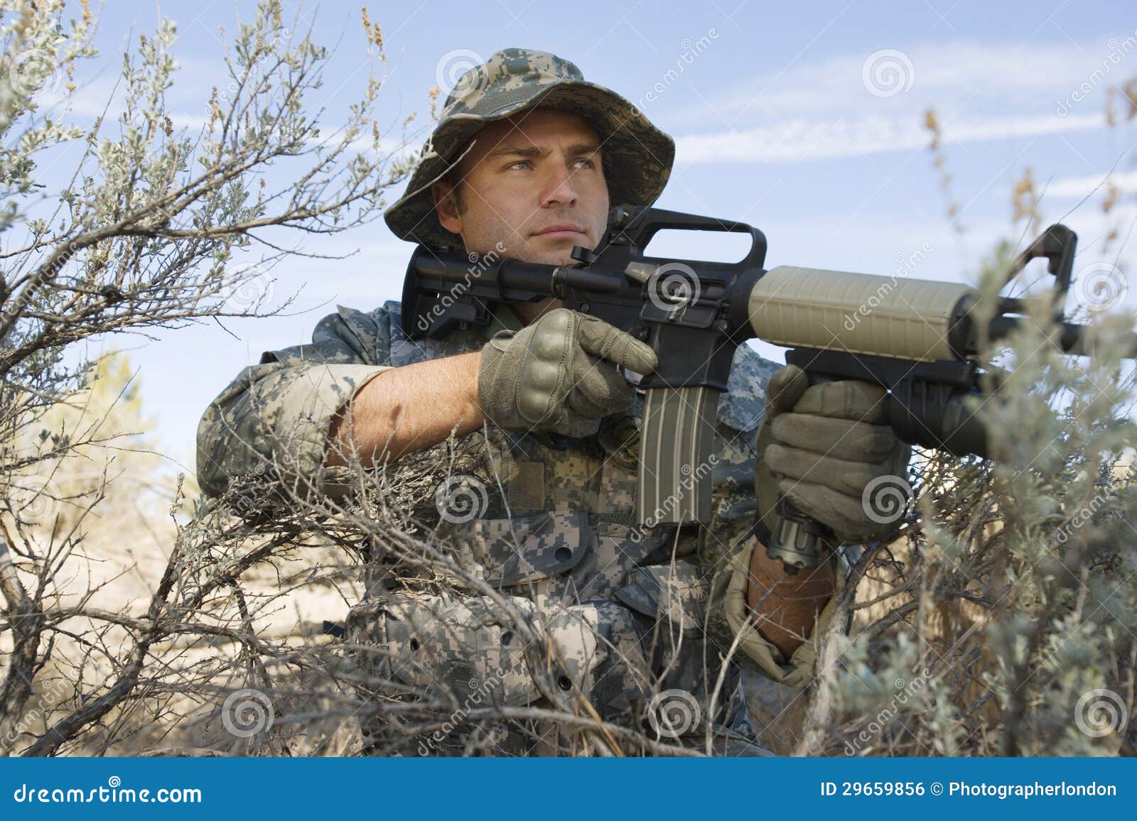 Soldier Aiming Machine Gun stock photo. Image of plant - 29659856