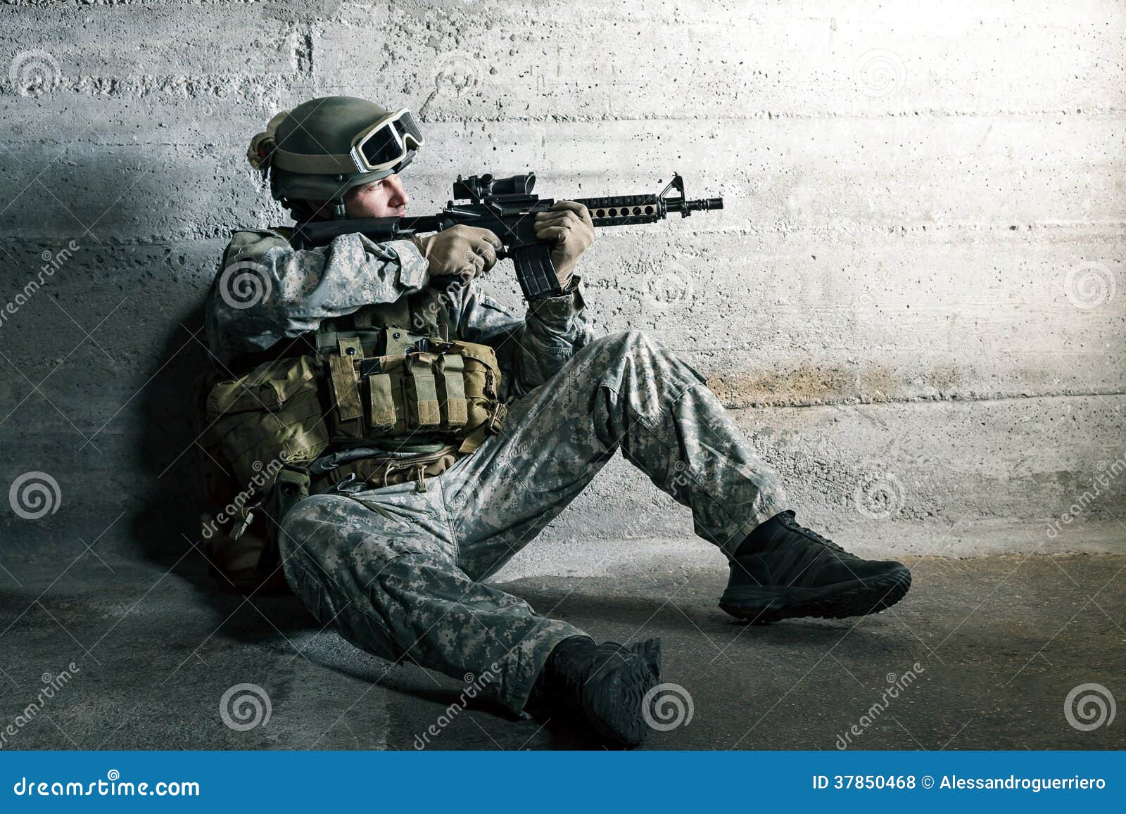 Soldier aiming a rifle stock photo. Image of goggles - 37850468