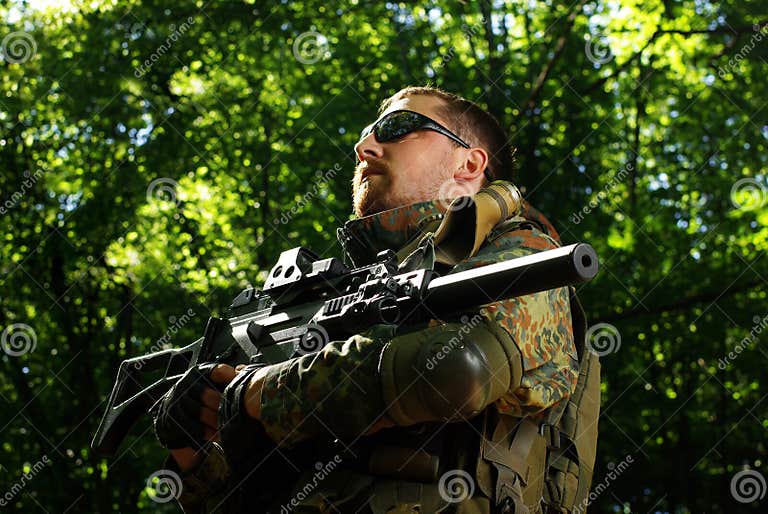 The Soldier with Automatic Rifle Stock Photo - Image of rifle, outdoors ...