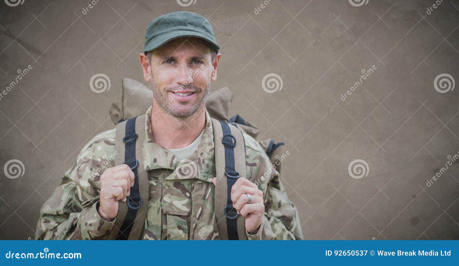 Soldier with Backpack Against Brown Background with Grunge Overlay ...