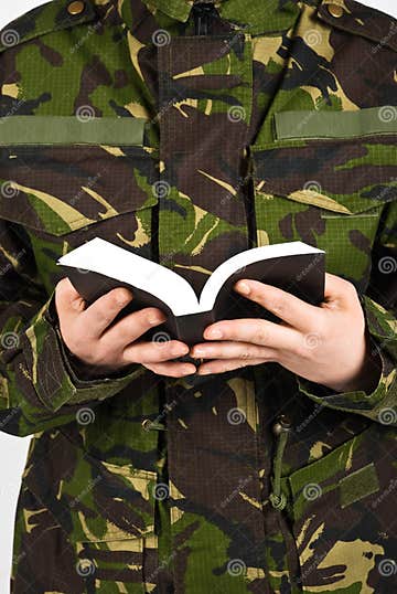 Soldier with bible stock photo. Image of beige, hold, book - 8821802