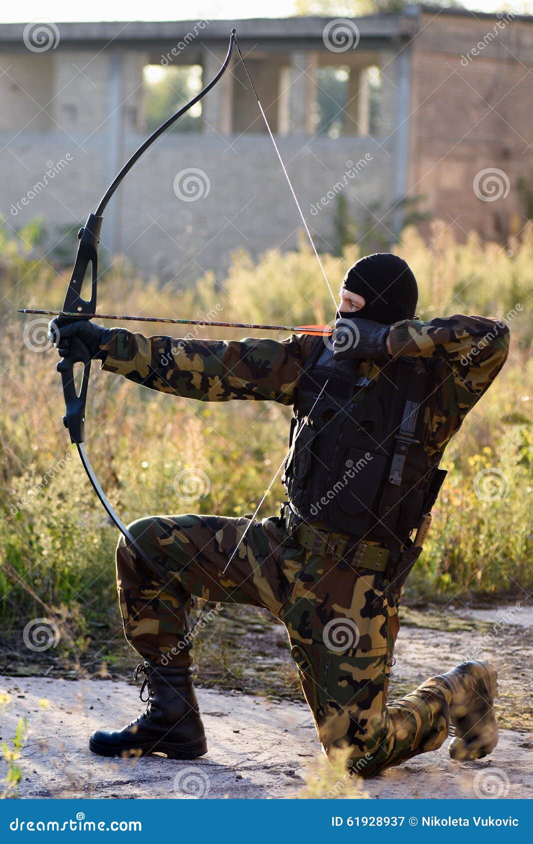 Soldier with bow and arrow stock image. Image of people - 61928937