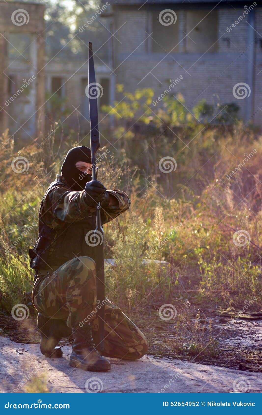 Soldier with bow and arrow stock photo. Image of nature - 62654952