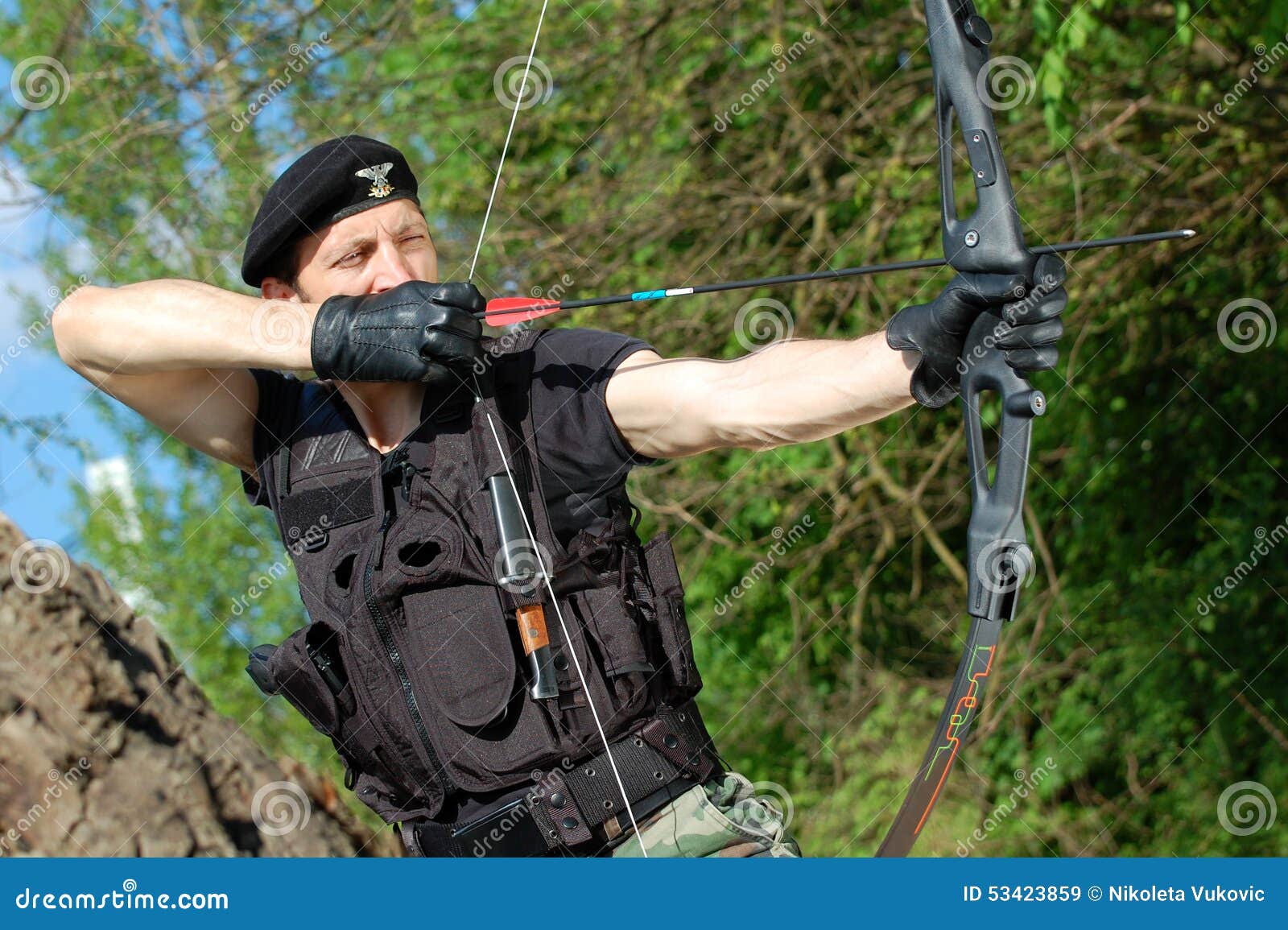 Soldier with bow and arrow stock image. Image of forest - 53423859