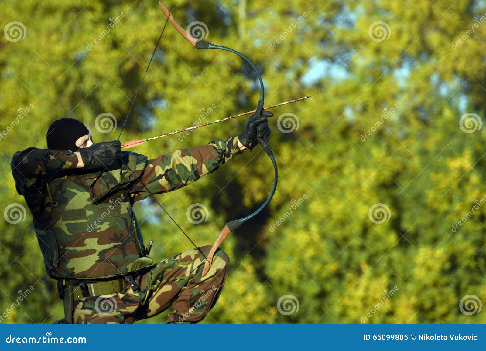 Soldier with bow and arrow stock image. Image of soldier - 65099805