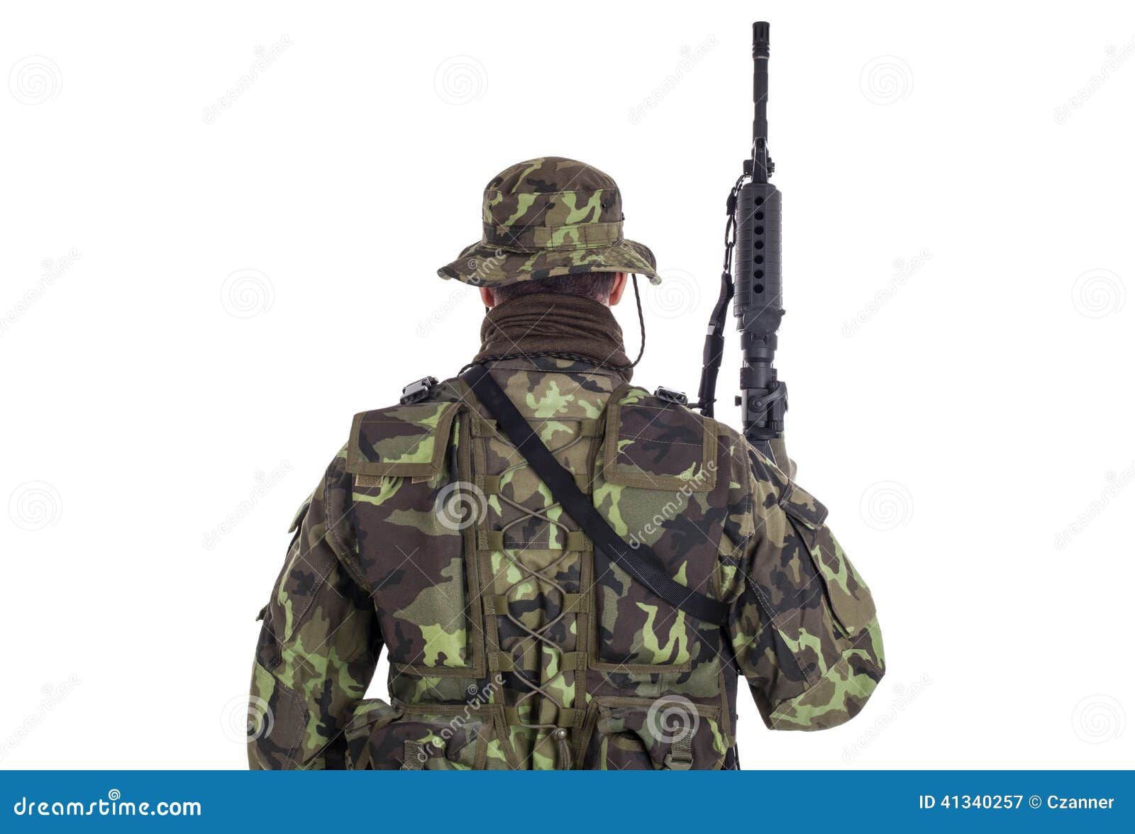 A Soldier In Camouflage Uniform Holds In His Hands A Kalashnikov ...