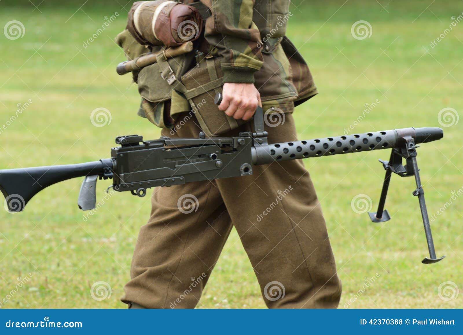 Soldier Carrying Machine Gun Stock Photo - Image of clothing, black ...