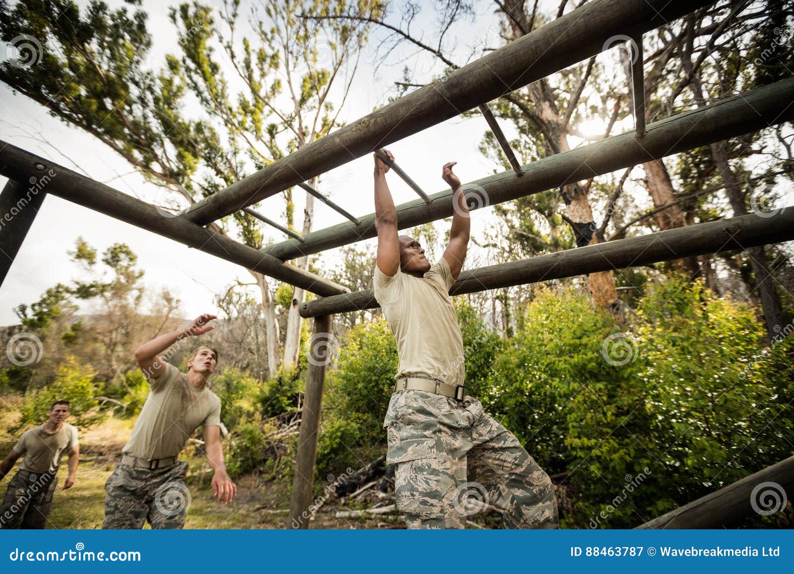 Soldier Climbing Monkey Bars Stock Image - Image of mixedrace, fitness ...